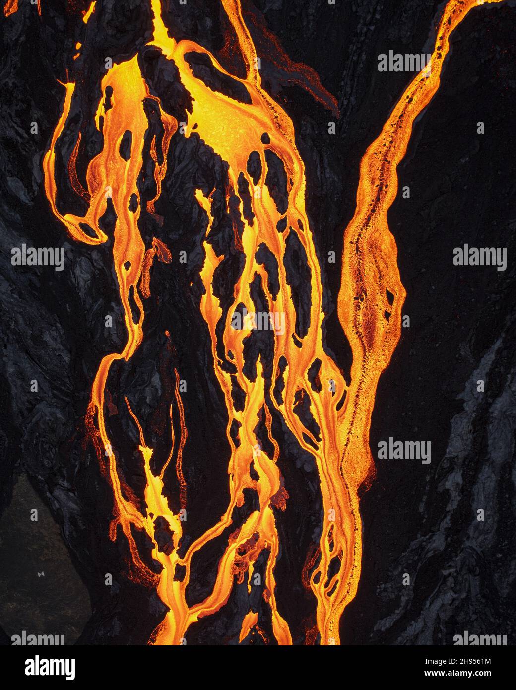 Vertical shot of lava rivers from the active volcano Stock Photo - Alamy