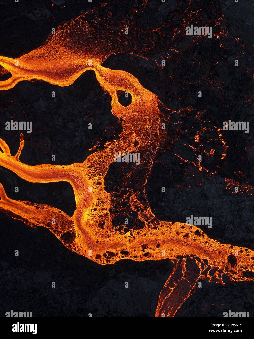 Vertical shot of lava rivers from the active volcano Stock Photo - Alamy