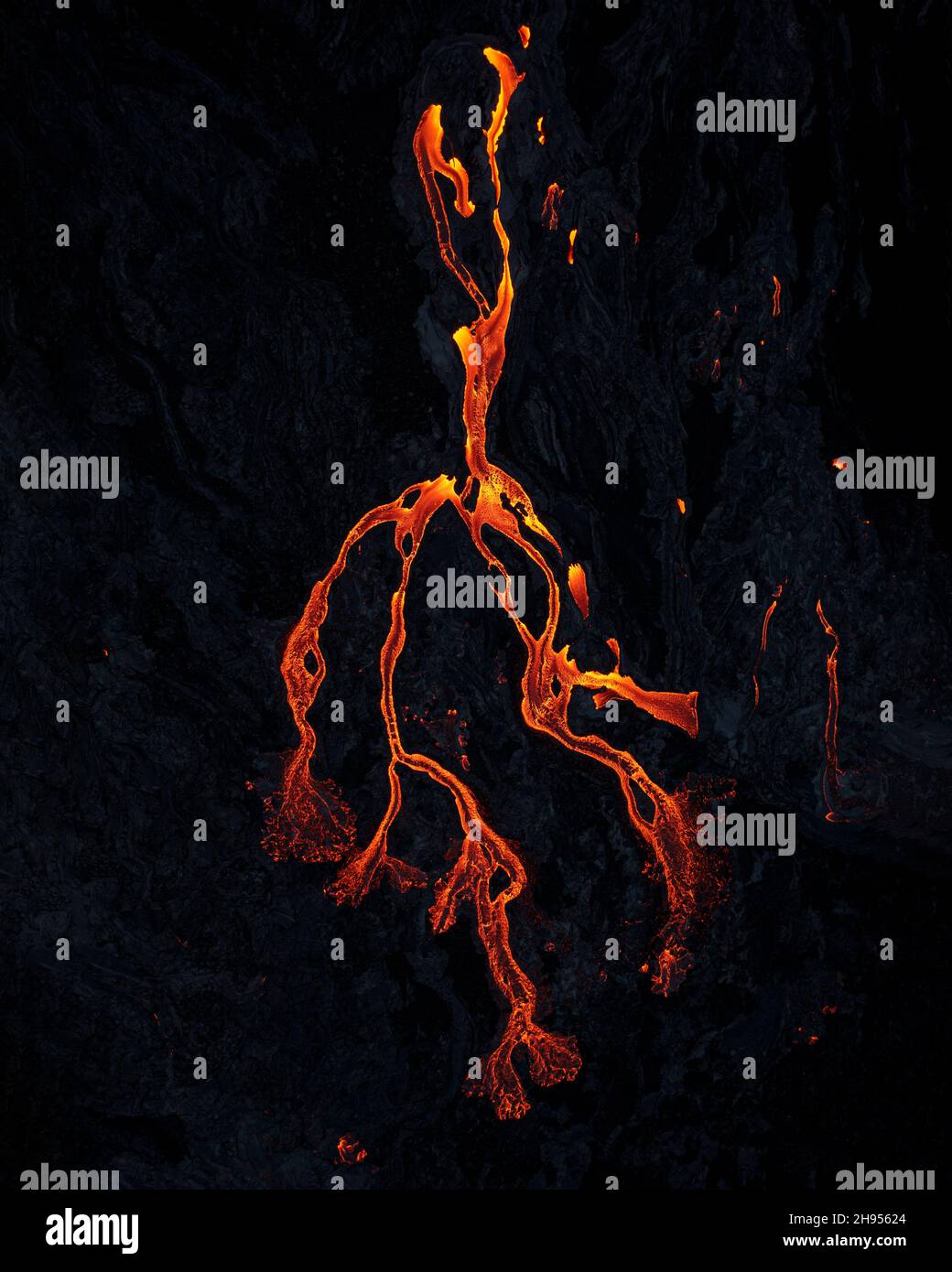 Vertical shot of lava rivers from the active volcano Stock Photo - Alamy