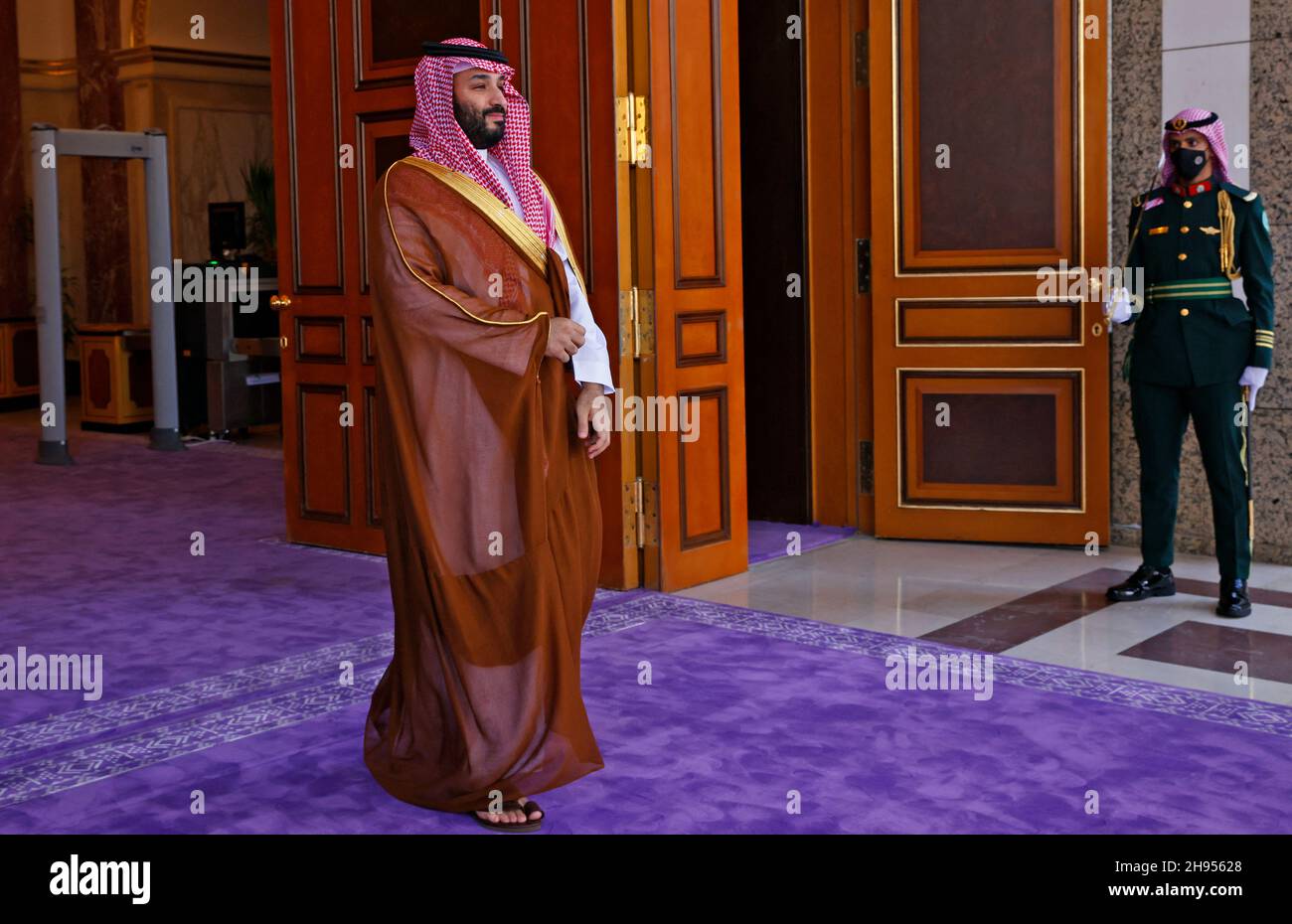Saudi Crown Prince Mohammed bin Salman prepares to receive the arriving ...
