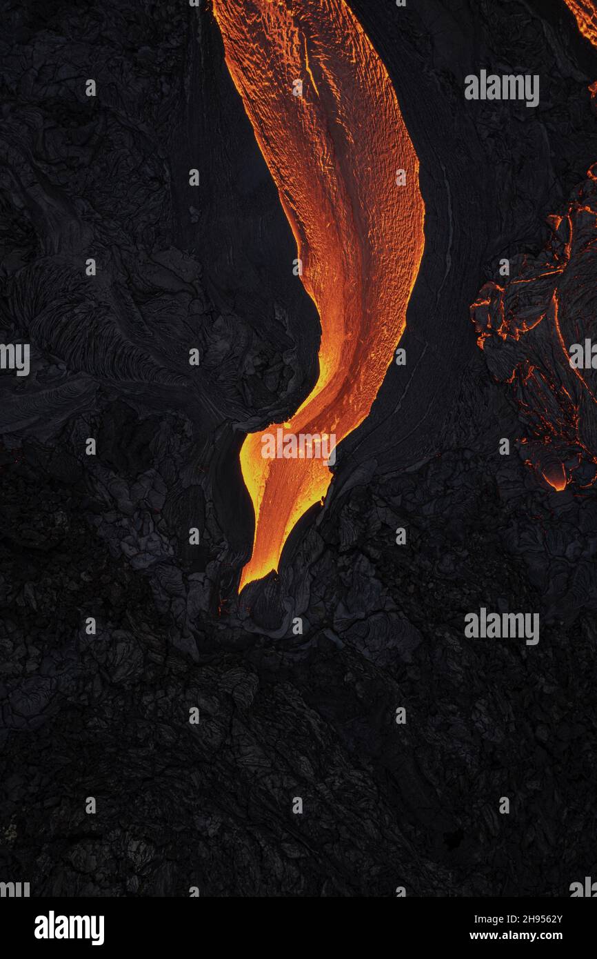 Vertical shot of lava rivers from the active volcano Stock Photo - Alamy