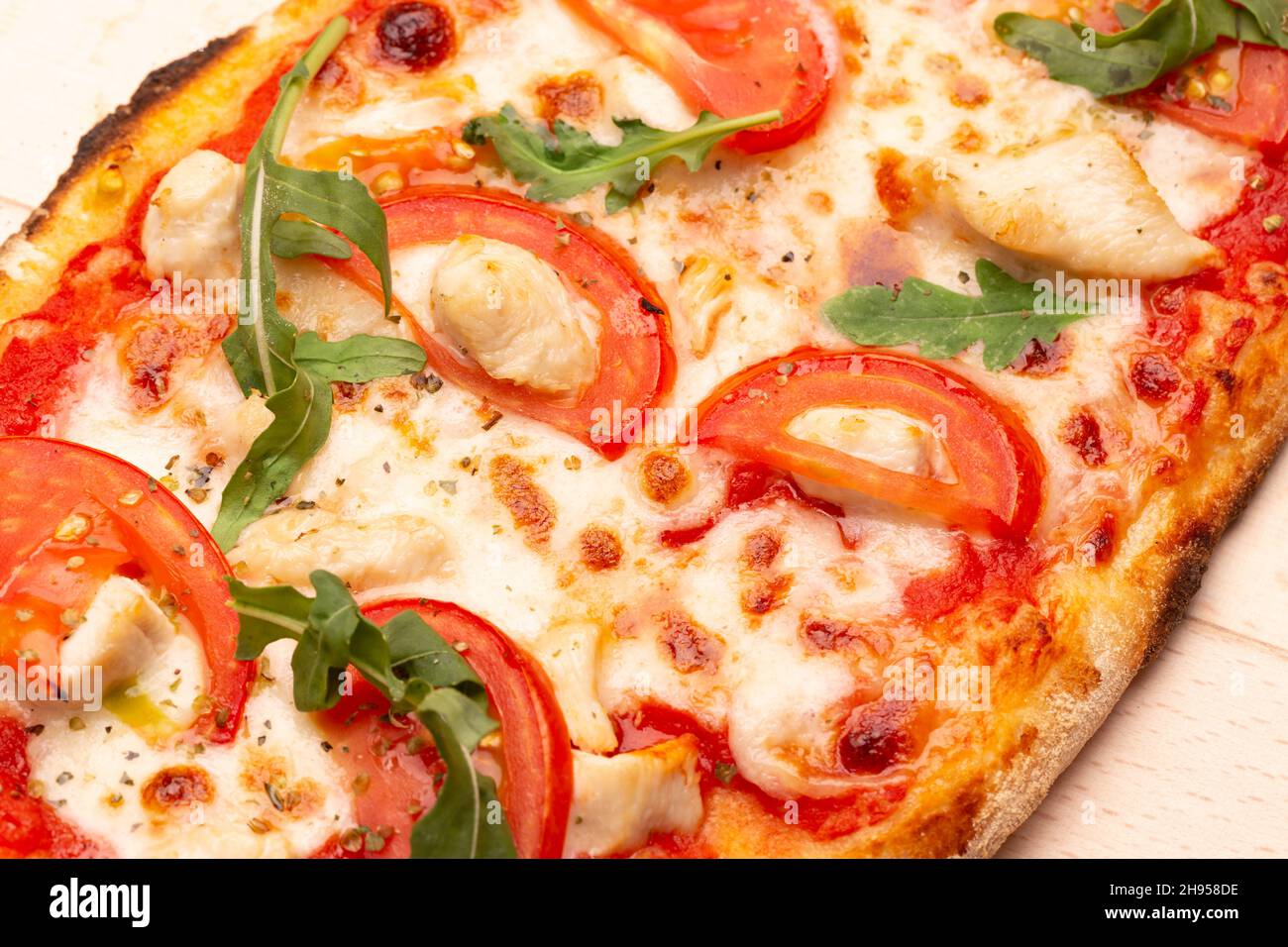 Delicious pizza served on wooden plate. Concept for advertising flyer ...