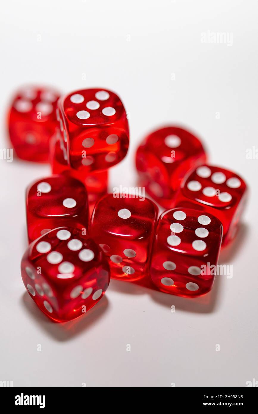 Vertical closeup of red 6 sided dice on a white background Stock Photo ...
