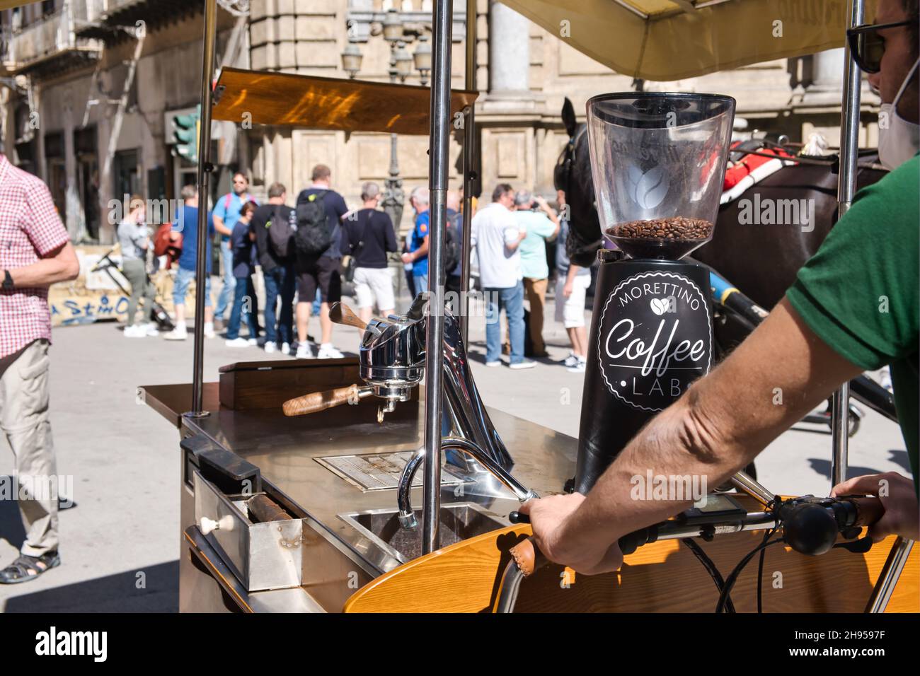 Street coffee service, a traditional coffee machine on wheels in ...
