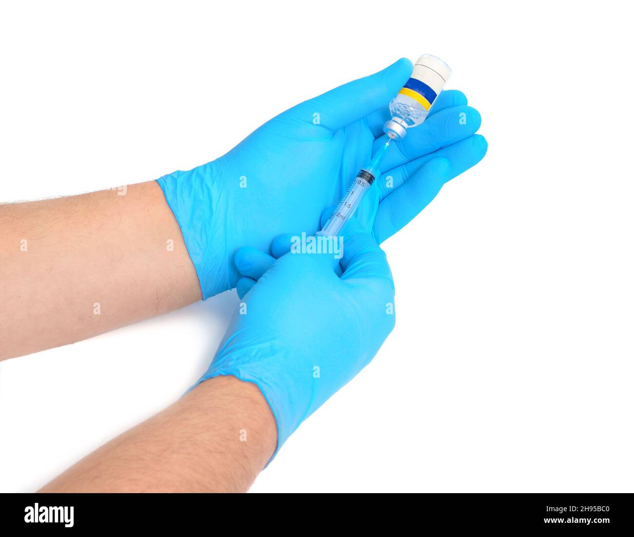 Taking drugs or vaccines into a syringe. Isolated on white background ...