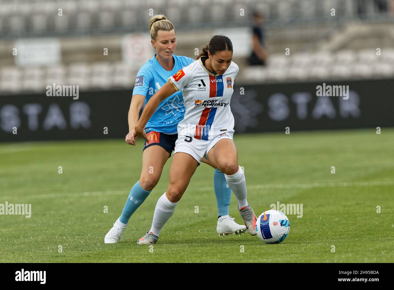 Ally Green of Sydney FC challenges Tiana Jaber of the Newcastle Jets ...