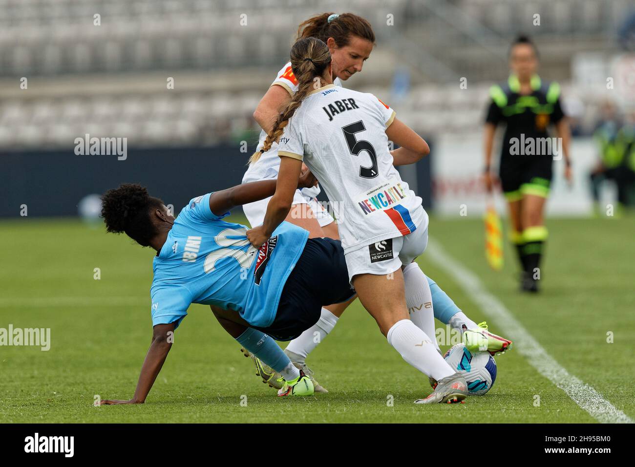 Tiana Jaber and Elizabeth Eddy of the Newcastle Jets challenges ...