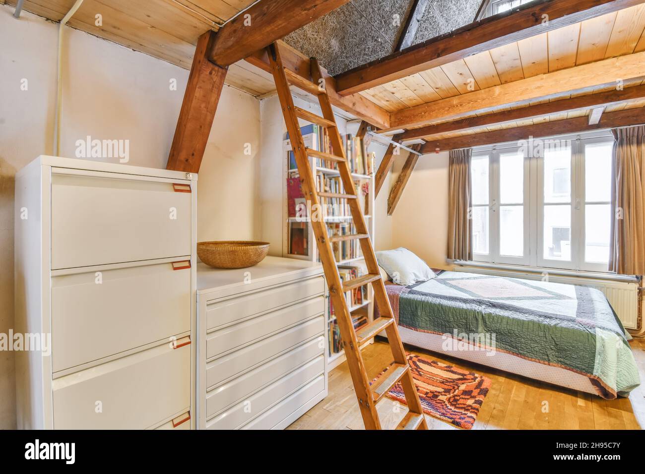 Cozy and extraordinary style of a bedroom with a double bed Stock Photo ...