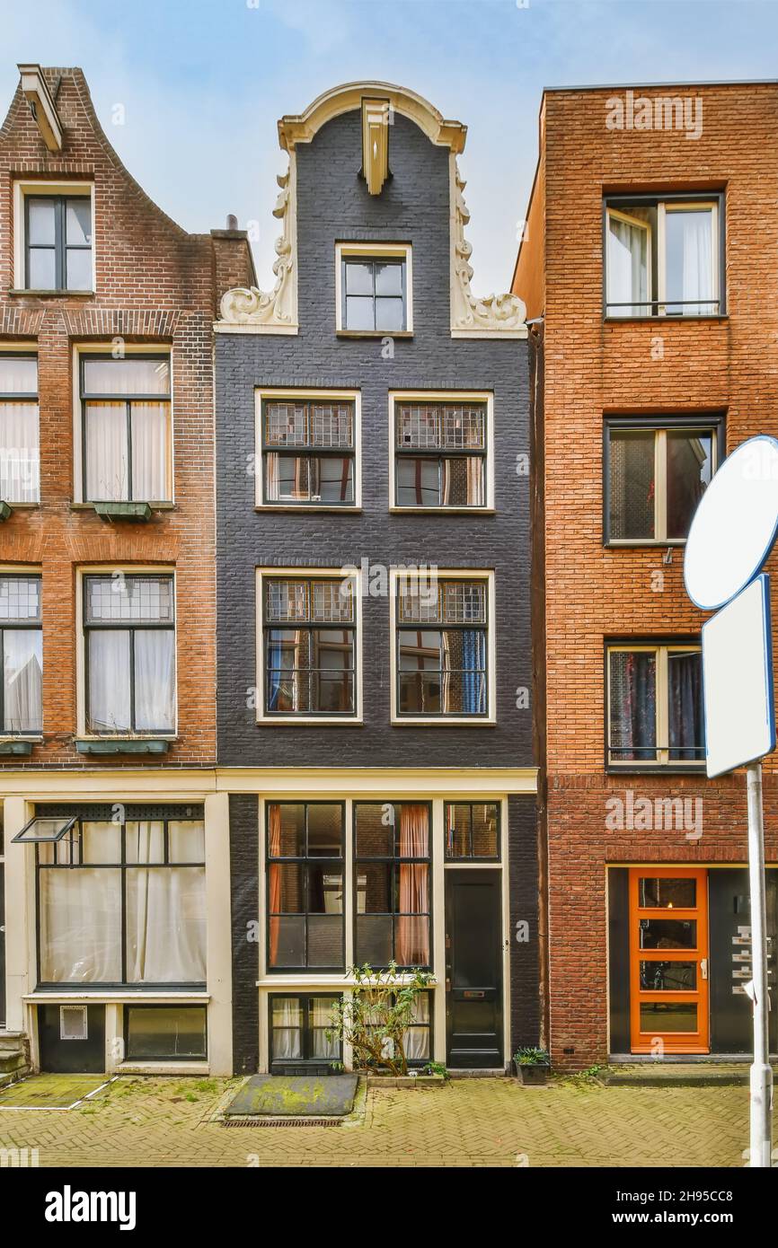 Wonderful view of architectural unusual brick houses Stock Photo - Alamy