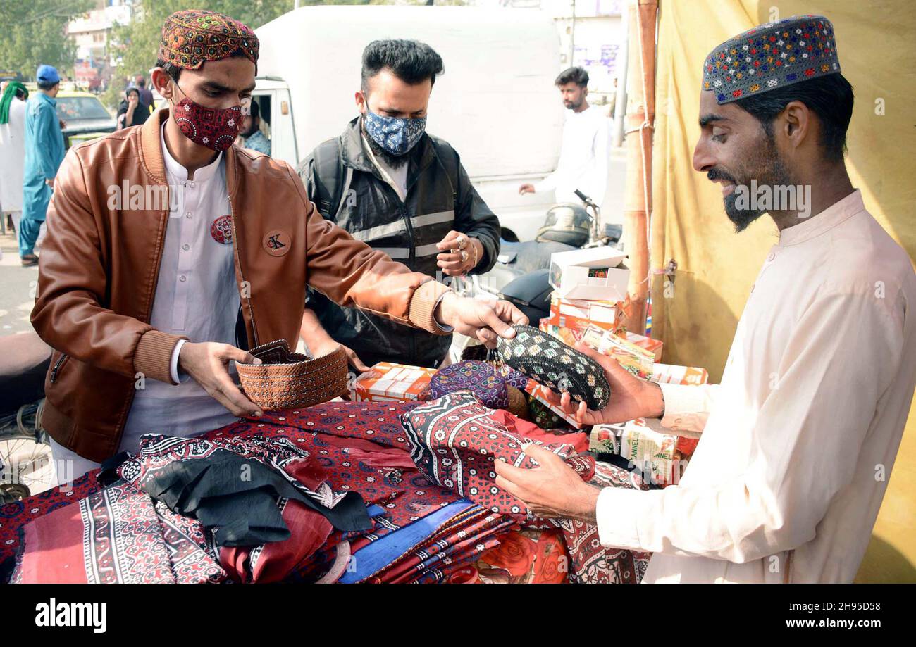 People purchase Sindh Topi and Ajrak (Sindh traditional dresses) to ...