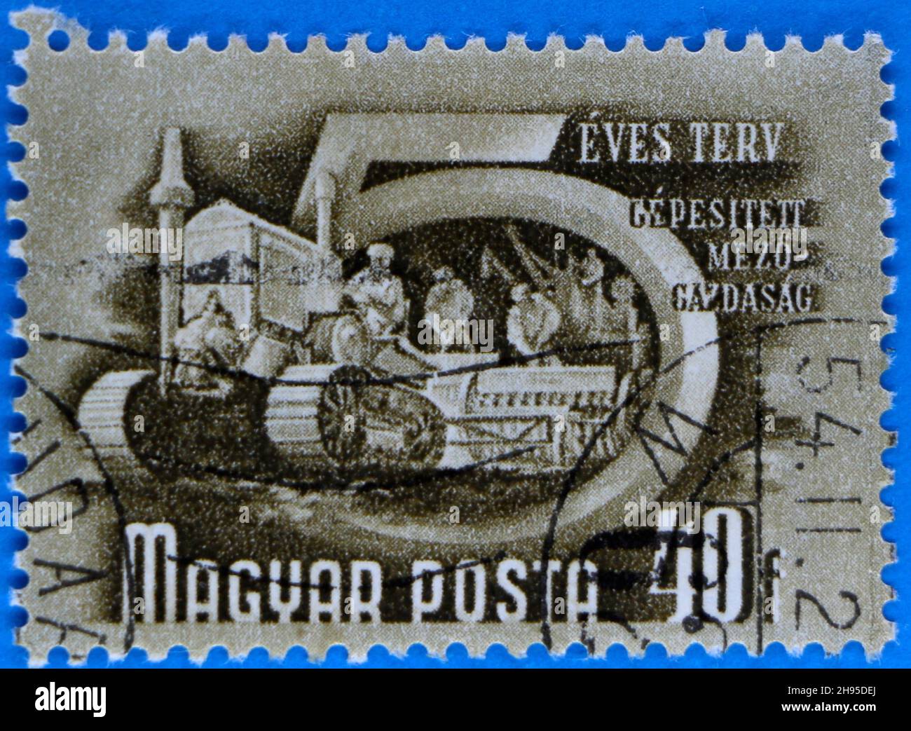 Photo of a 40 f Hungarian postage stamp featuring a tracked tractor and ...