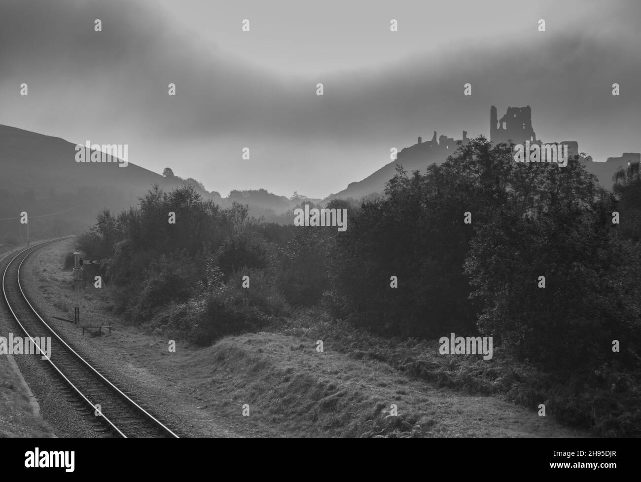 Corfe Castle in the morning mist, Corfe, Dorset Stock Photo - Alamy