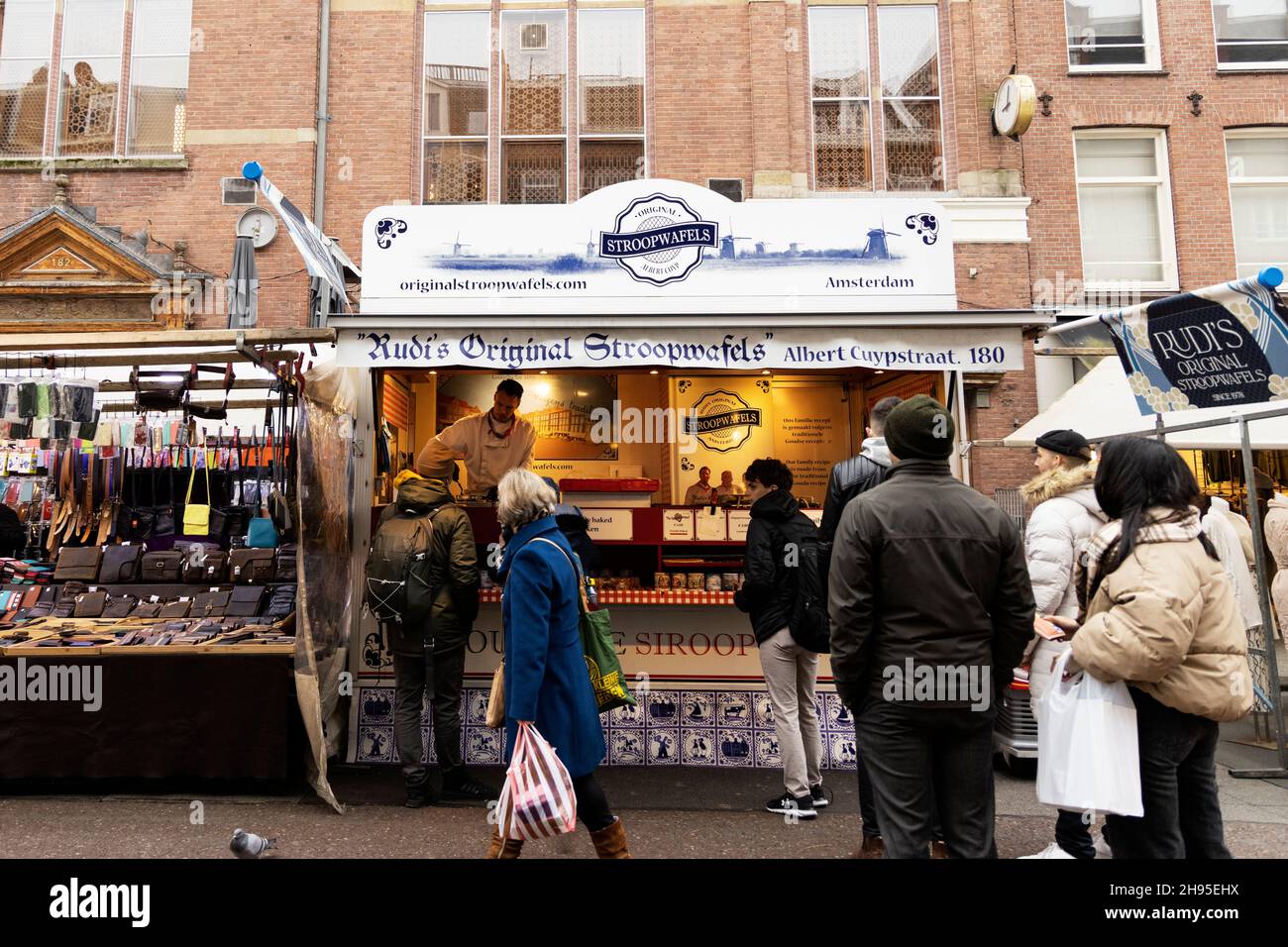 Customers on a winter day at Rudi's Original Stroopwafels stand at the ...