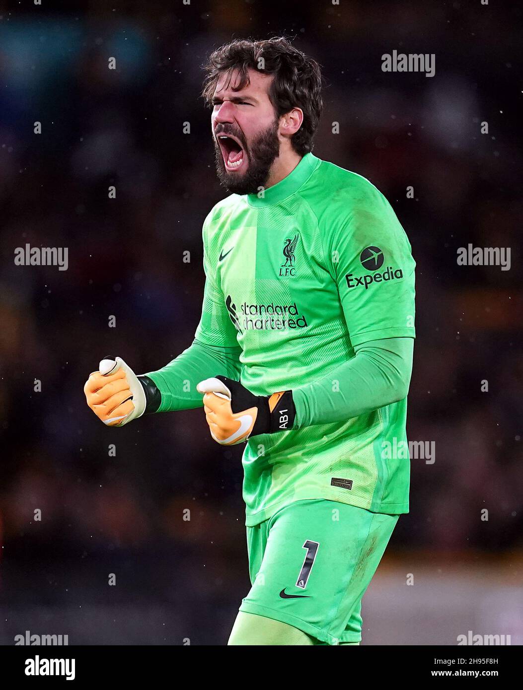Liverpool goalkeeper Alisson celebrates their side's first goal of the ...