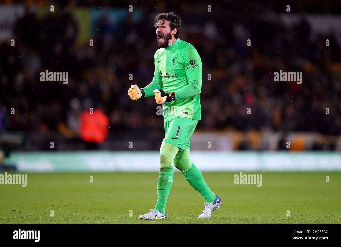 Liverpool goalkeeper Alisson celebrates their side's first goal of the ...