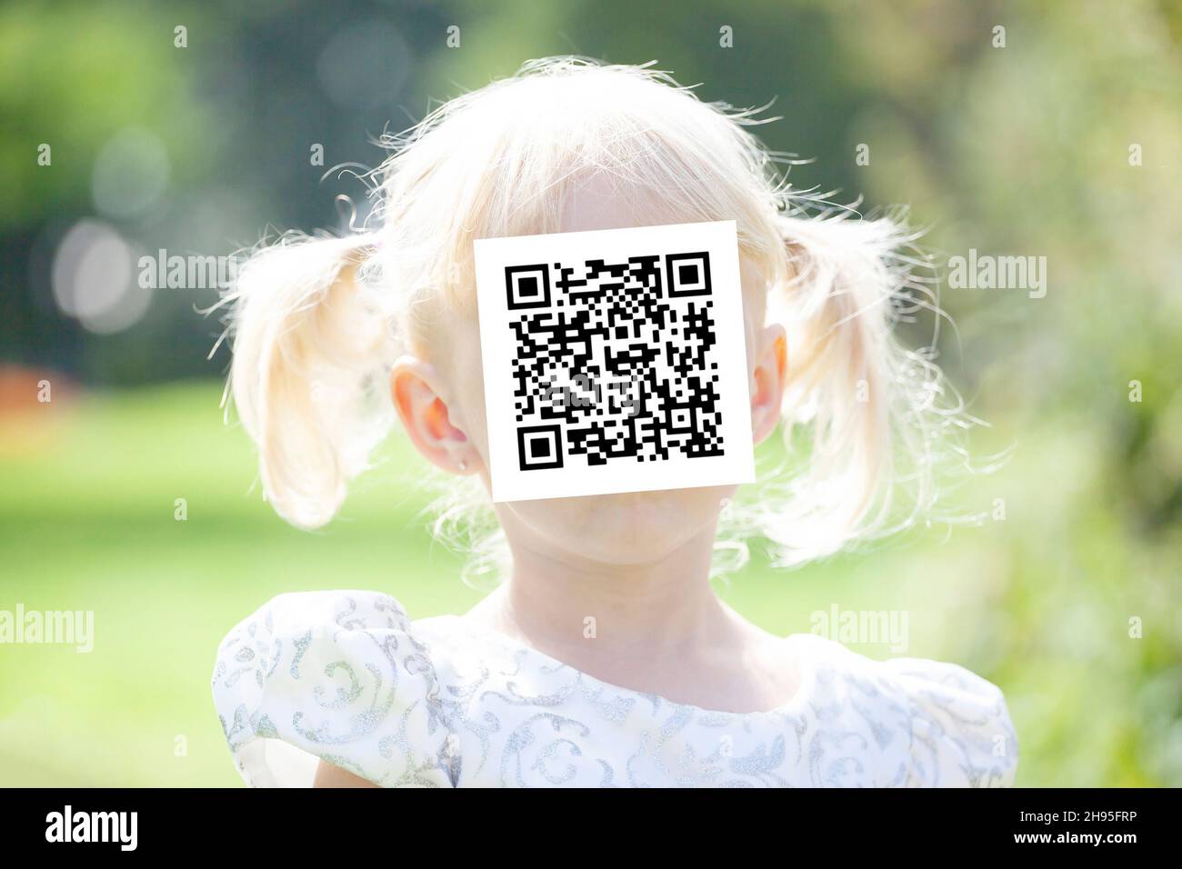 qr code on the child's face. High quality photo Stock Photo - Alamy