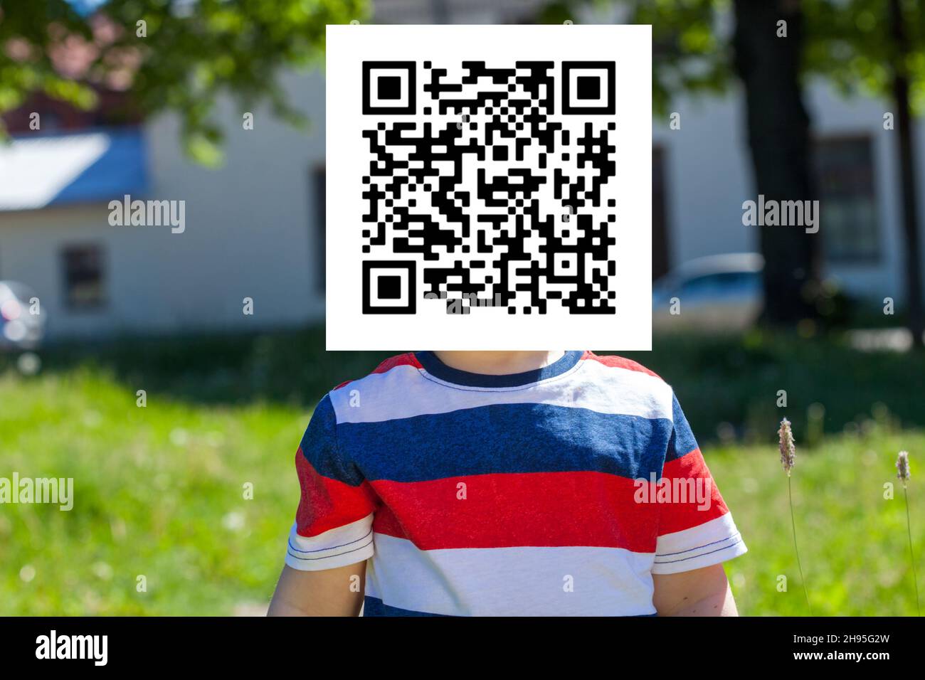 qr code on the child's face. High quality photo Stock Photo - Alamy