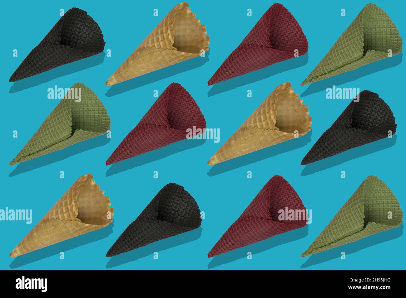 Various-colored ice cream cones with shadows on a blue background Stock ...