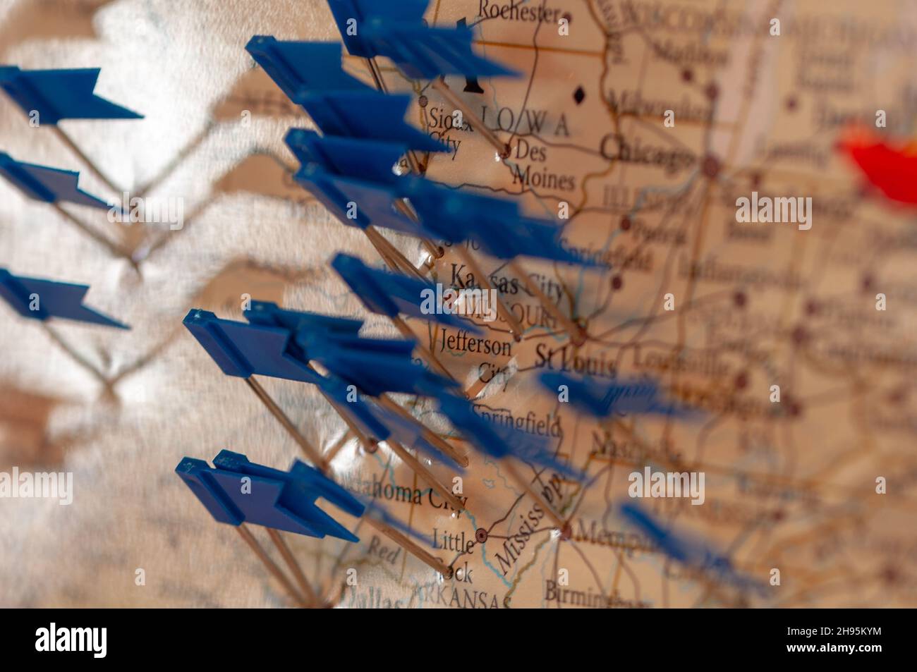Closeup shot of a bunch of little blue flags on a map Stock Photo - Alamy