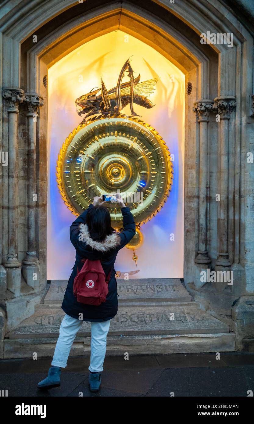 A chinese foreign student takes photo at dusk of the illuminated Corpus ...