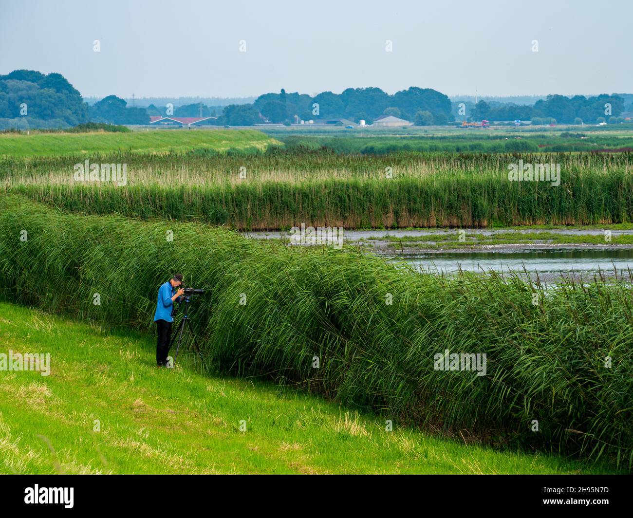 Young photographer preparing camera hi-res stock photography and images ...