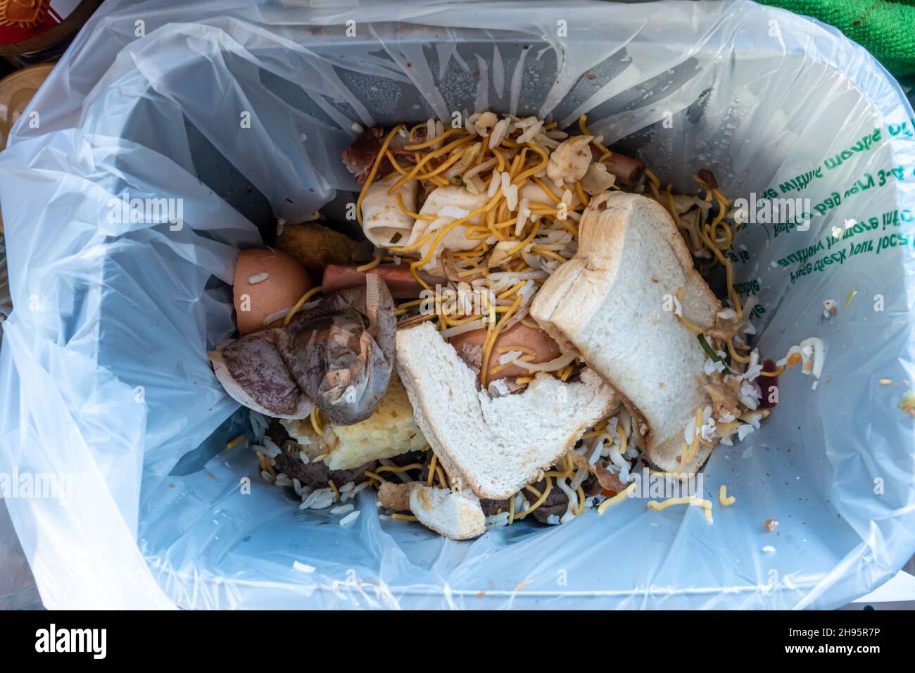 Leftover food waste on a caddy in a residential kitchen Stock Photo - Alamy