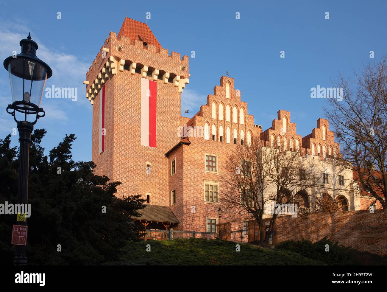 Rebuilt Royal Castle on the „Hill of Przemysl” with polish flag, Poznan ...