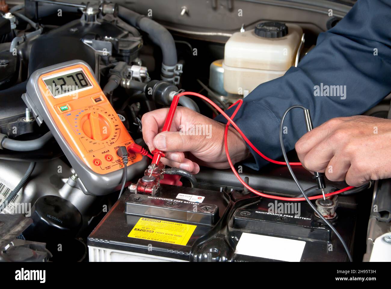 Vehicle battery installation Stock Photo - Alamy