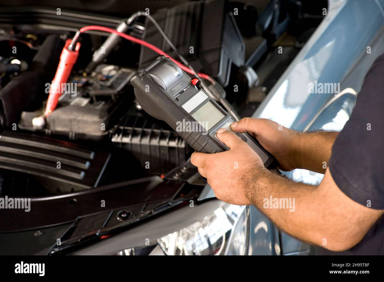 Vehicle battery installation Stock Photo - Alamy