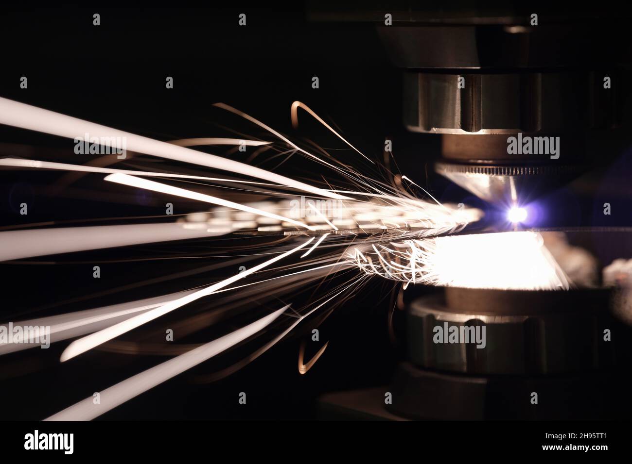 Stream of sparks from cutting metal, flash Stock Photo - Alamy