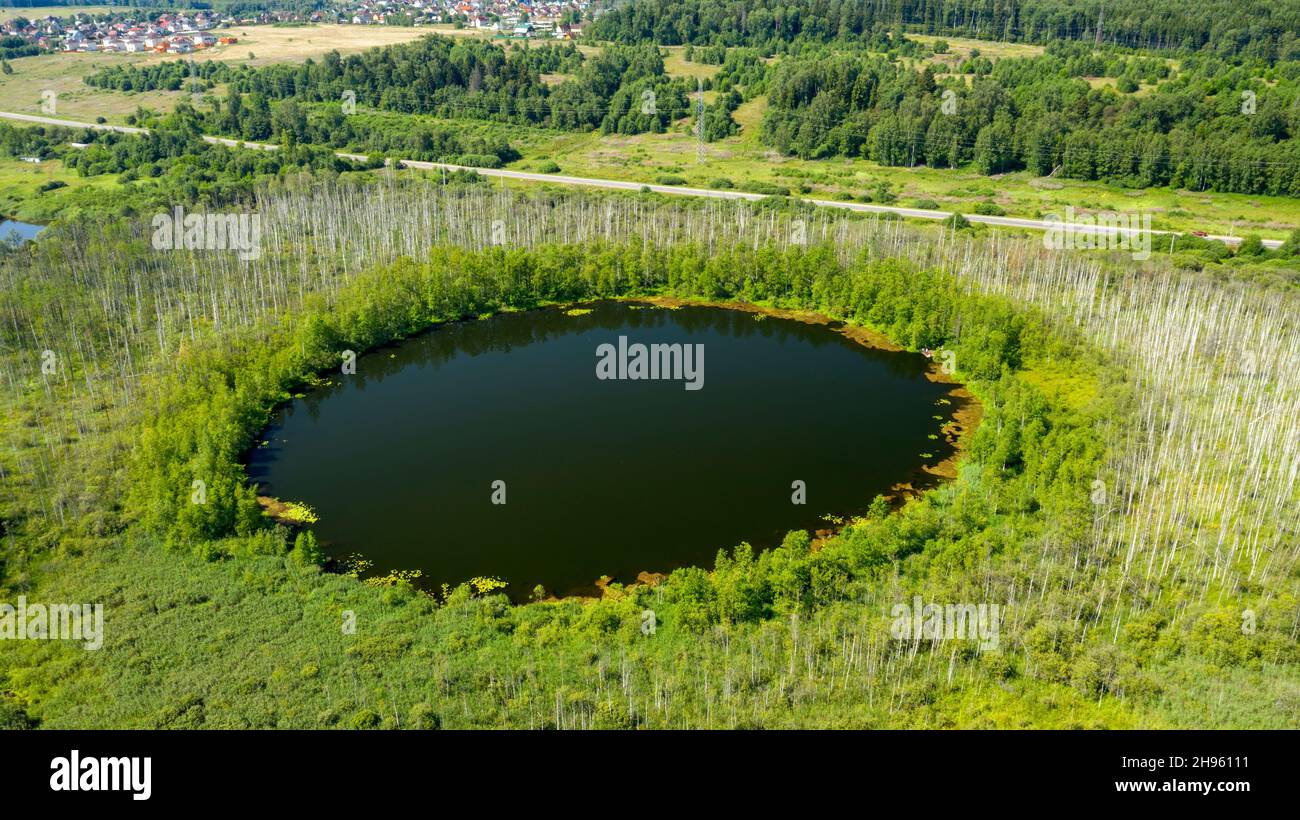 Aerial view of Bottomless Lake in forest of Solnechnogorsk District ...