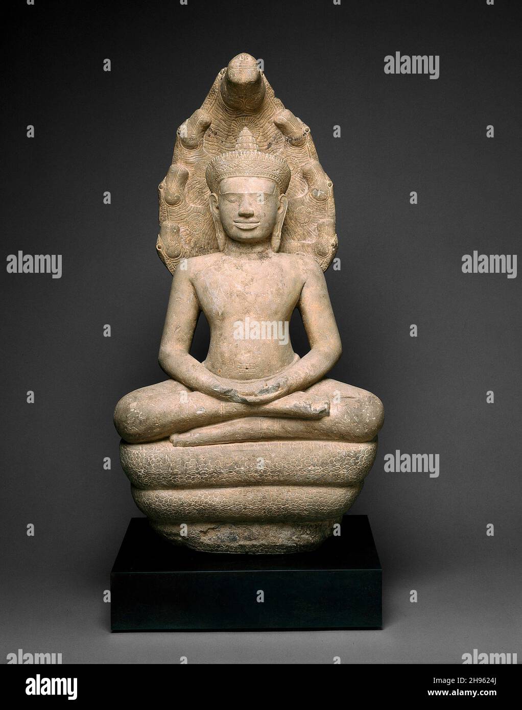 Buddha Enthroned on a Serpent (Naga), Angkor period, 13th century Stock ...