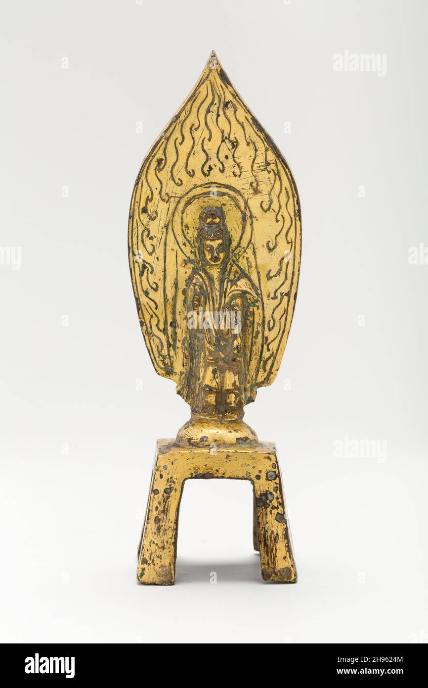 Guanyin (Avalokiteshvara) Standing before Flaming Aureole and Holding a ...