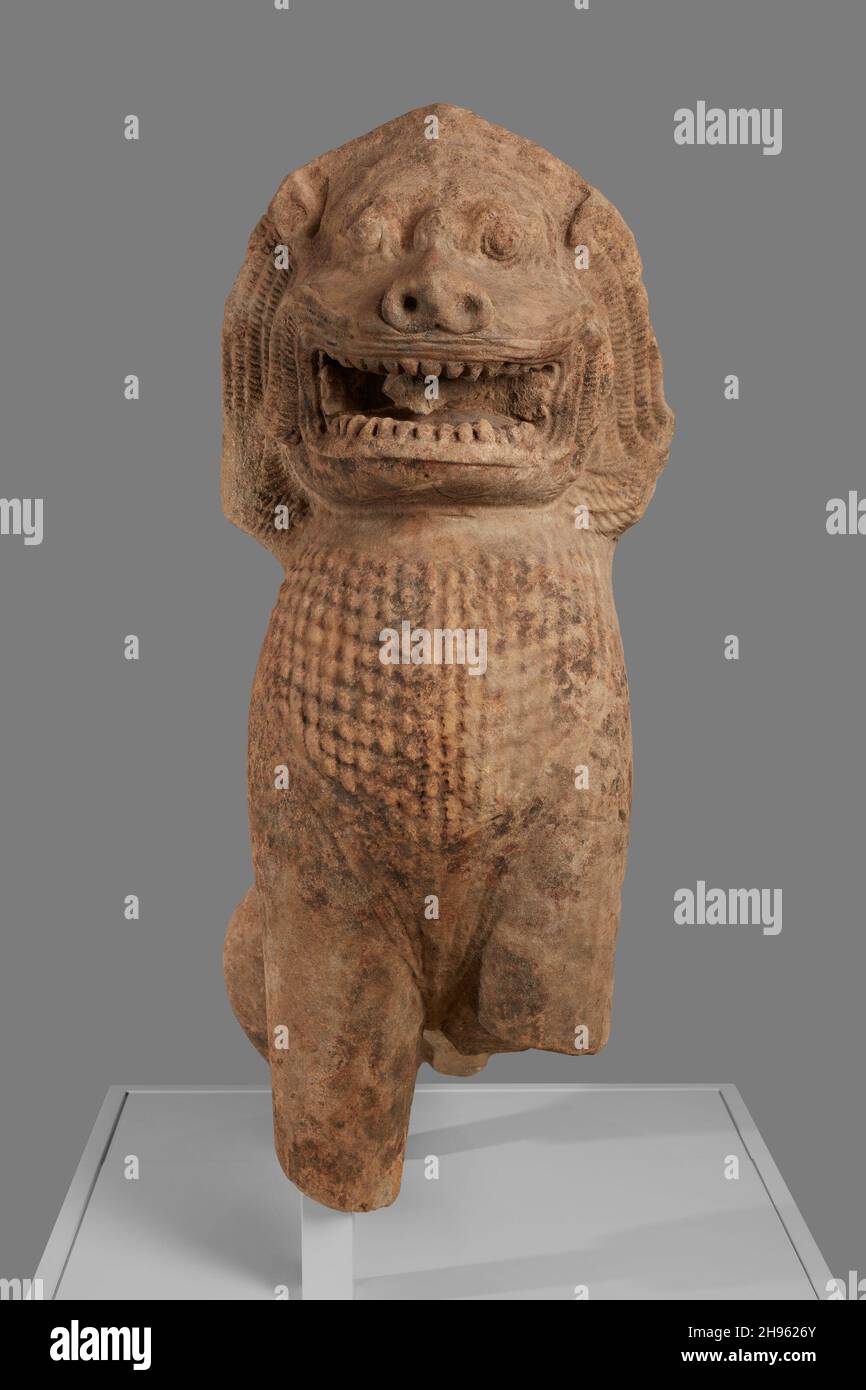 Guardian Lion, Angkor period, 12th century Stock Photo - Alamy