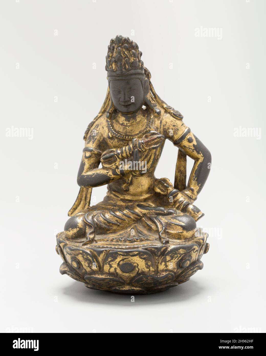 Sitting holding lotus flowers hi-res stock photography and images - Alamy