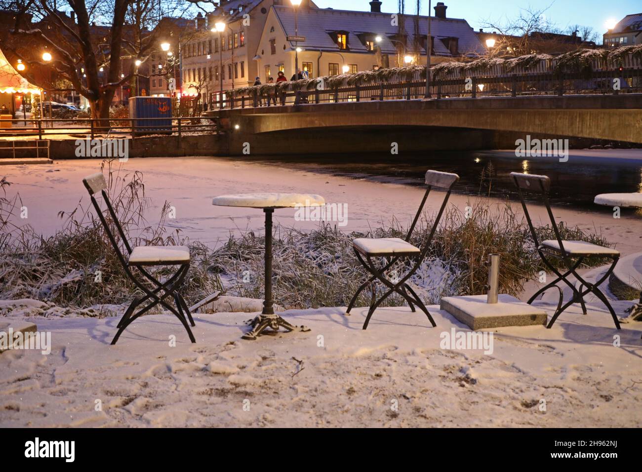 Daily life in Uppsala, Sweden, during Saturday. A deserted outdoor cafe ...