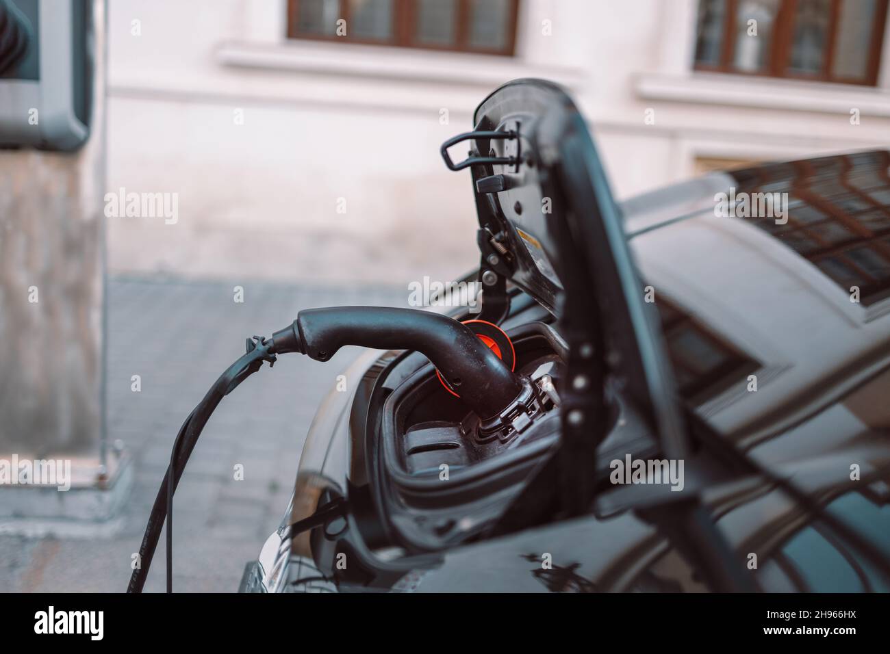 Power supply for electric car charging on urban europe street with ...