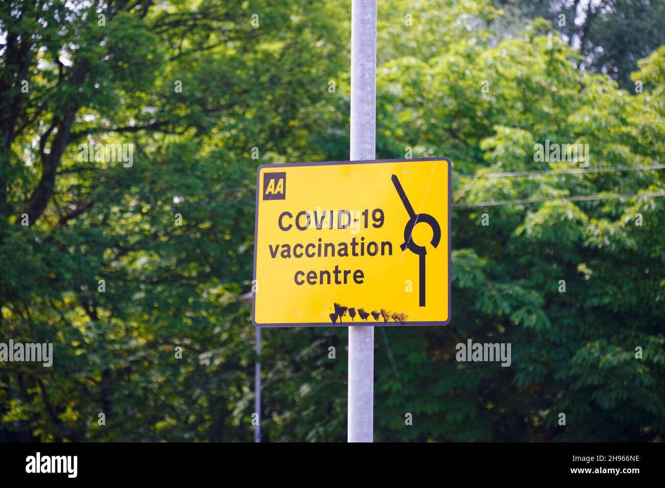 Vaccination medical centre for Covid-19 road sign Stock Photo - Alamy