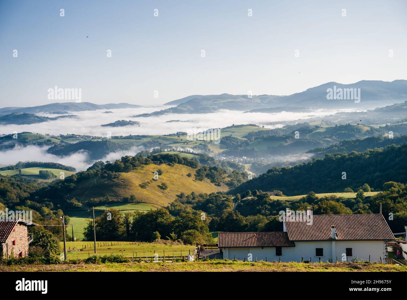 Village and road in mountains valley. Pyrenees. Camino de Santiago ...