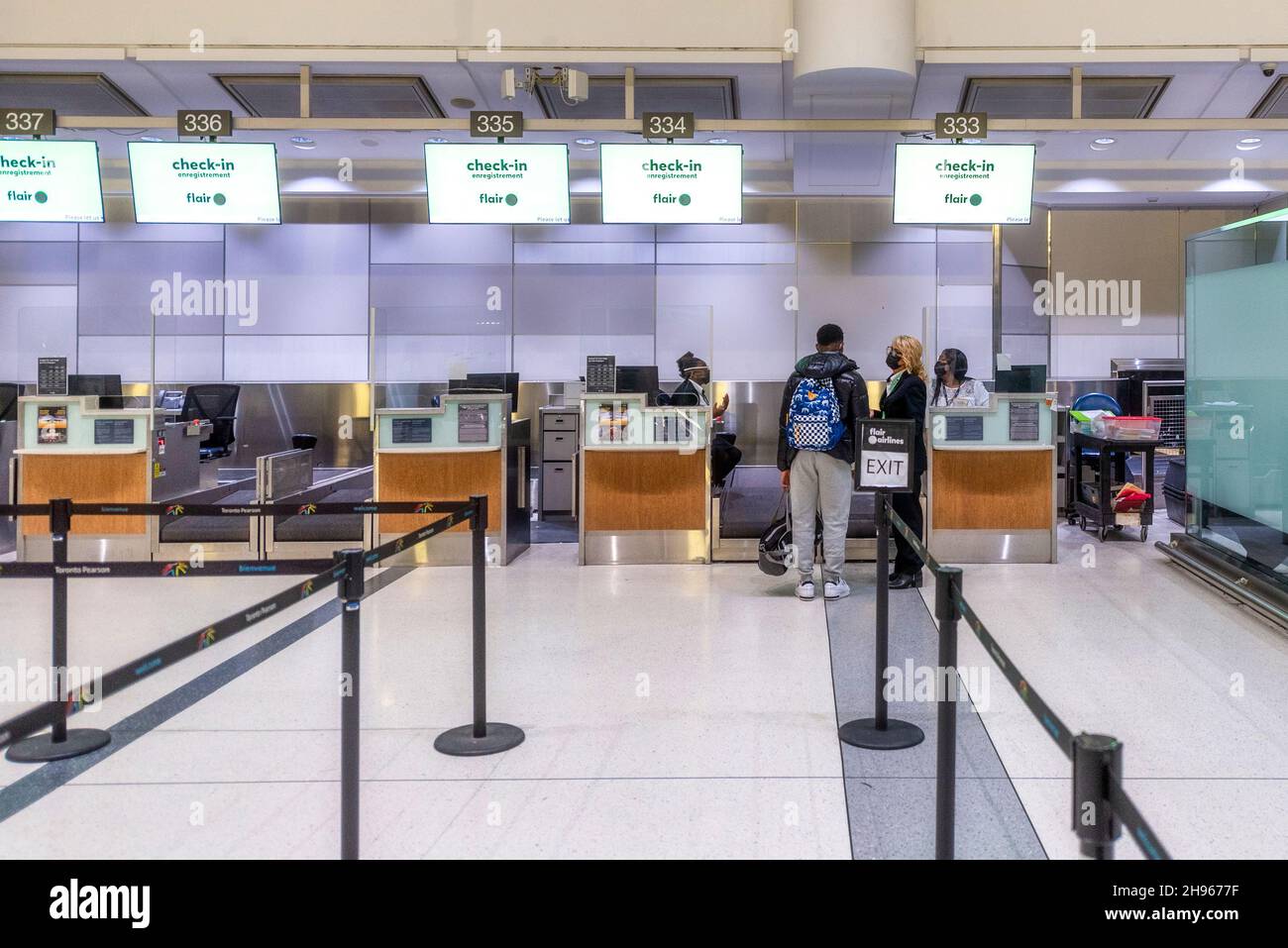 Empty counters at Terminal 3 at Pearson International Airport. Dec. 4 ...