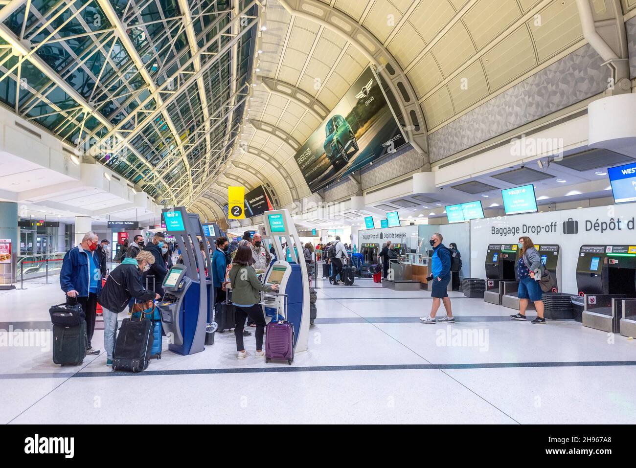 Passengers at self check-in machines and the Interior architecture of ...