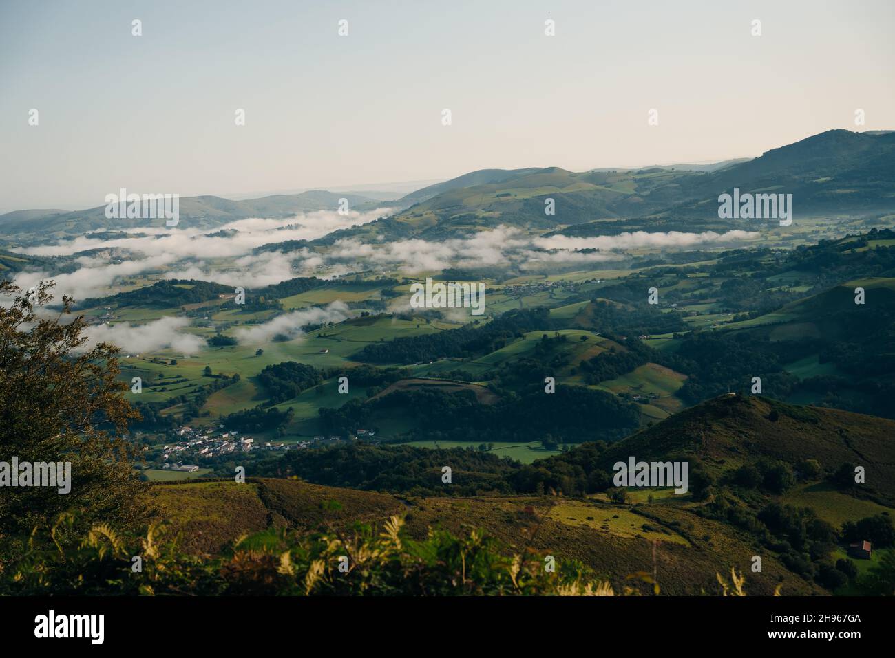 Village and road in mountains valley. Pyrenees. Camino de Santiago ...