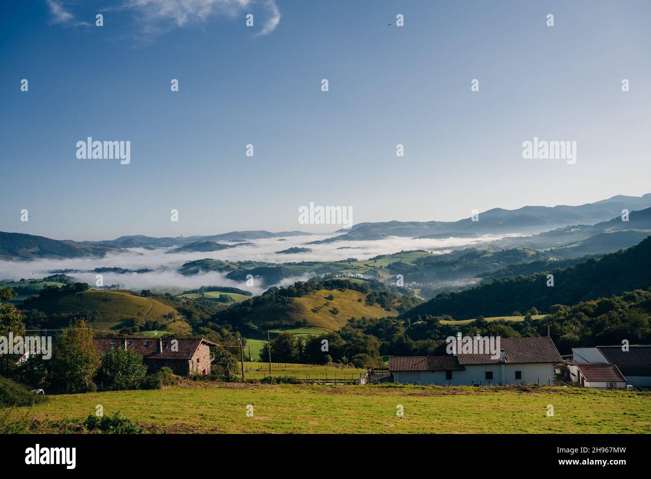 Village and road in mountains valley. Pyrenees. Camino de Santiago ...