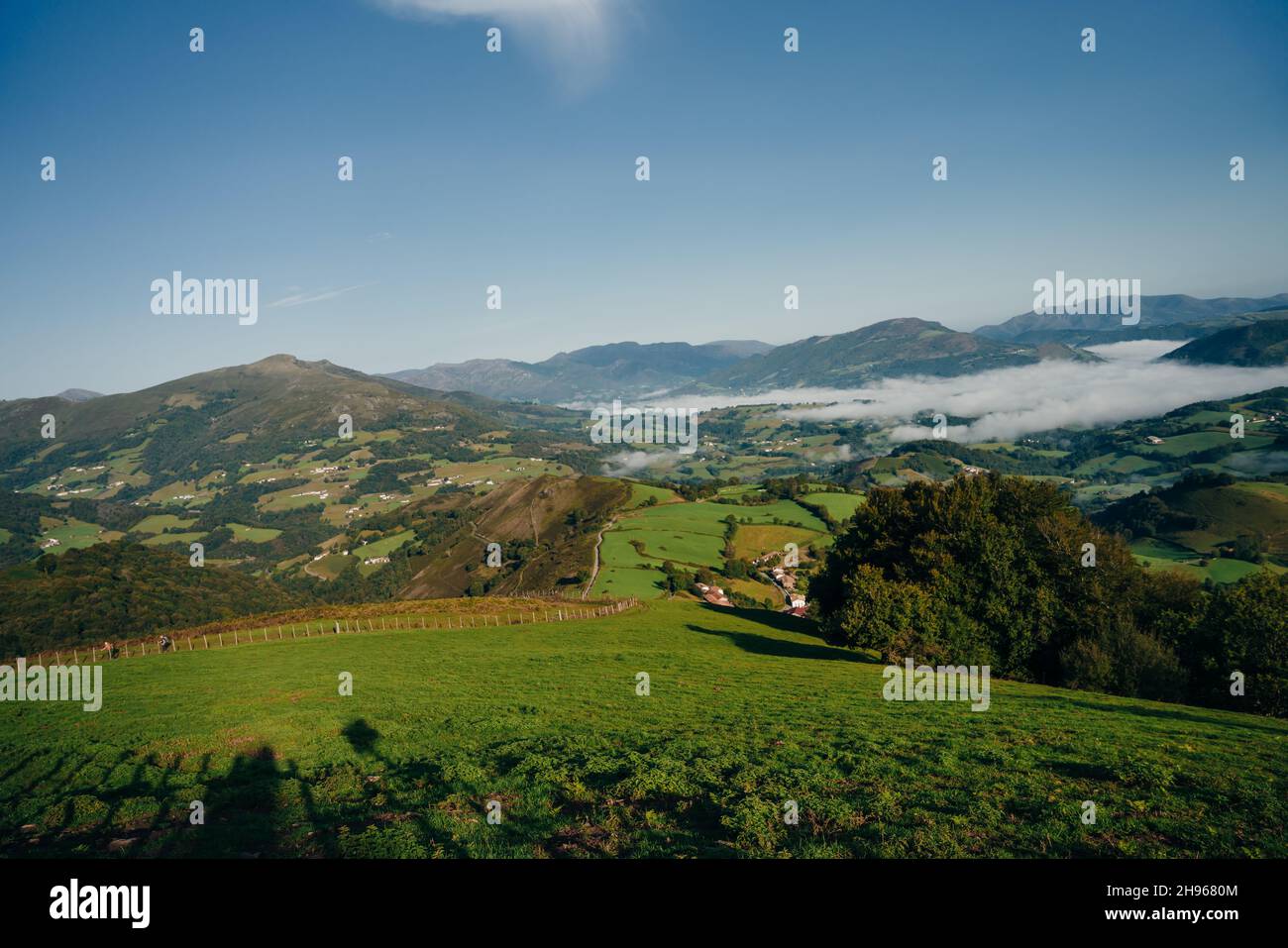 Village and road in mountains valley. Pyrenees. Camino de Santiago ...