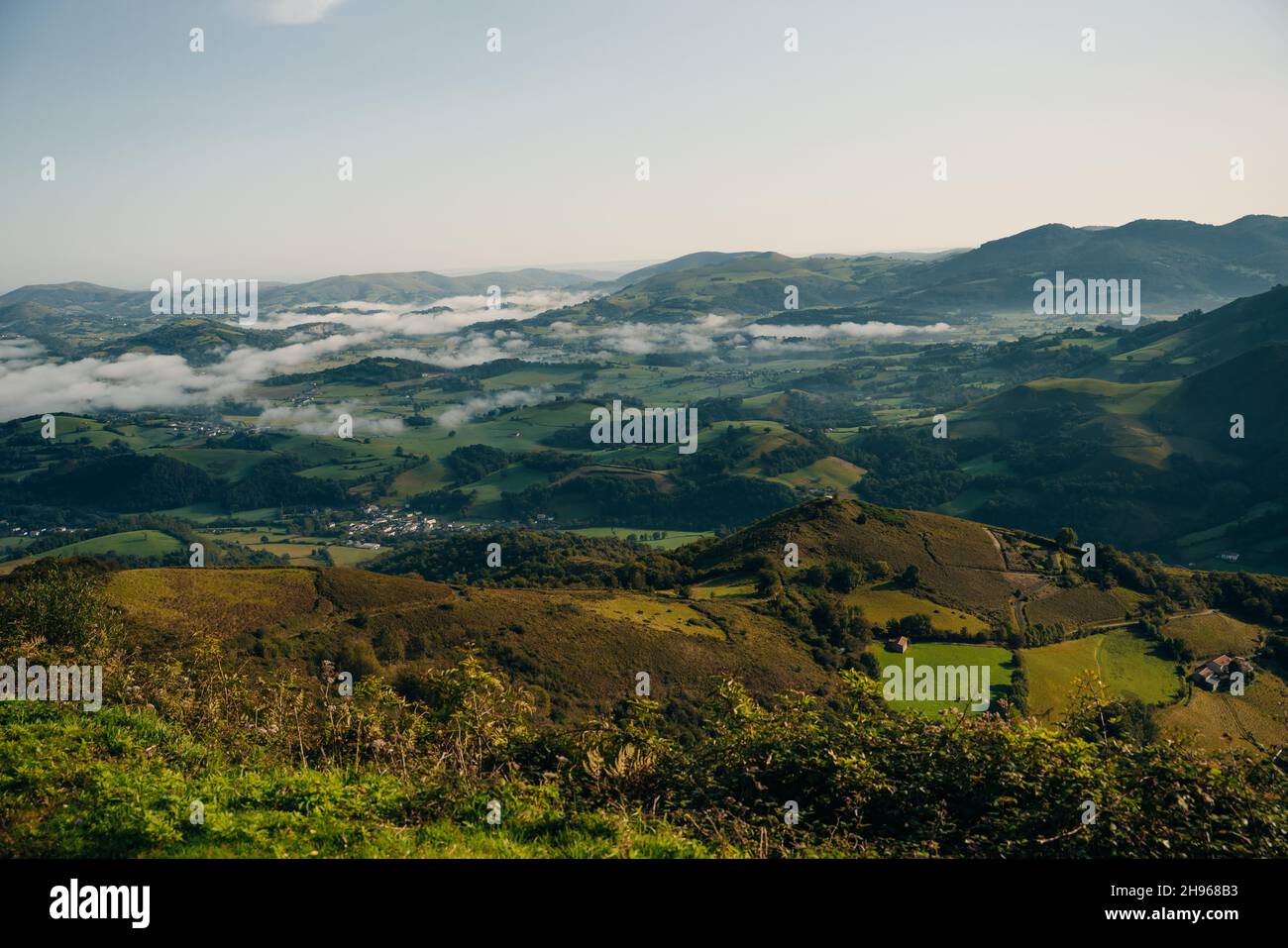 Village and road in mountains valley. Pyrenees. Camino de Santiago ...