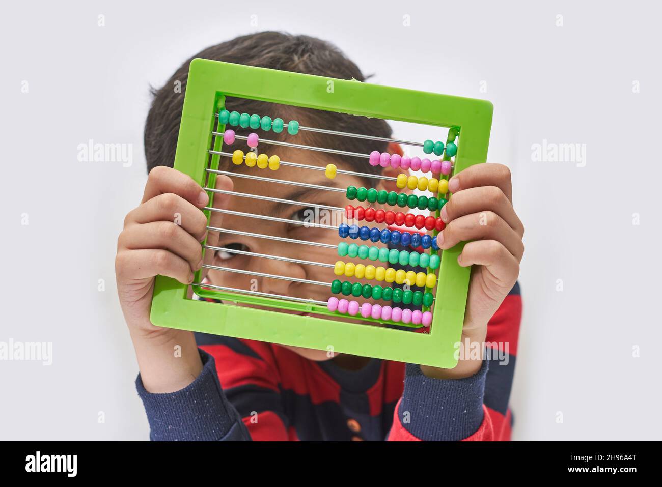 Schoolboy do mental math. Mental mathematics. 8 years old multiracial ...