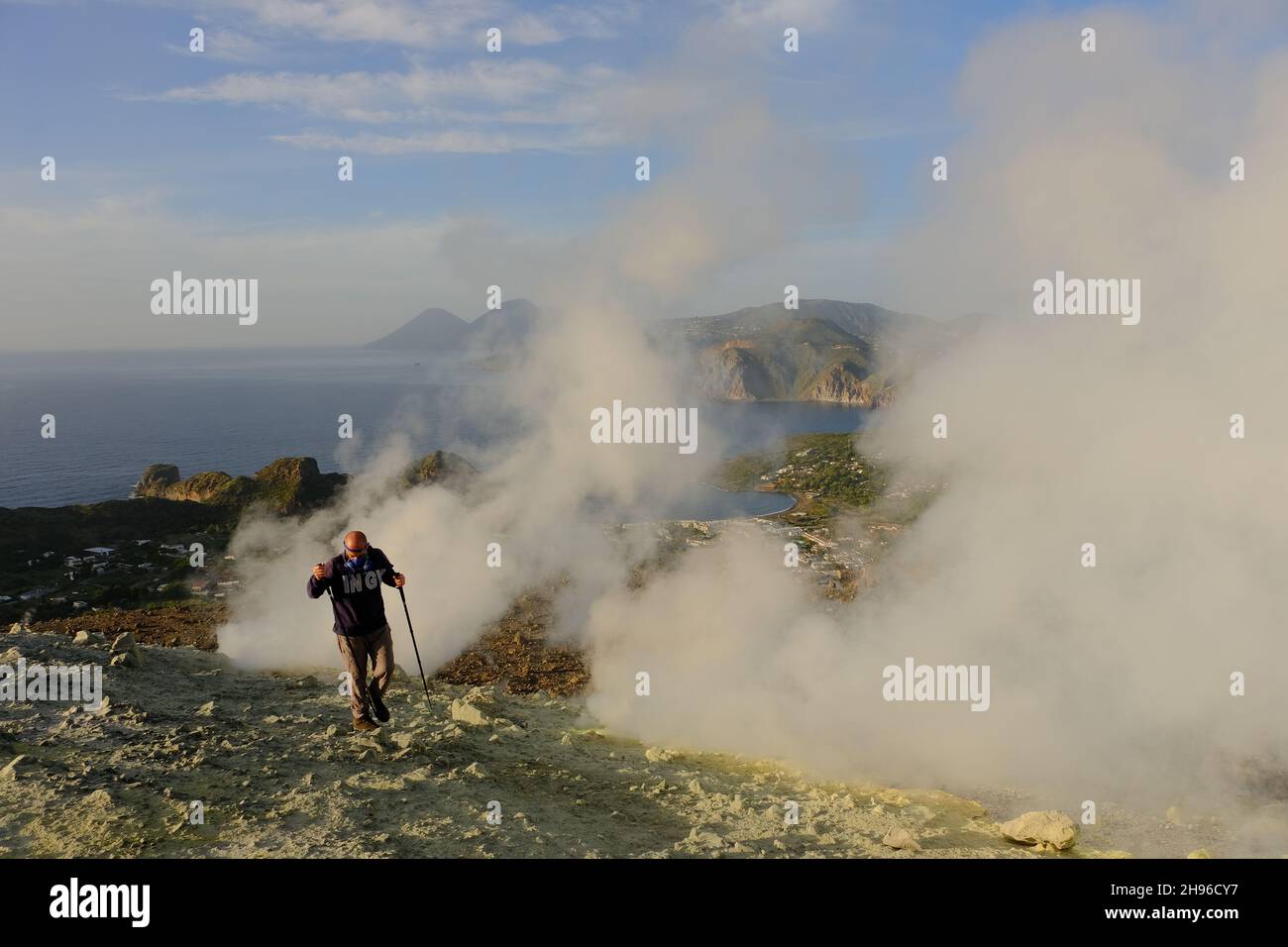 An Italian vulcanologist of the INGV works on the main crater of ...