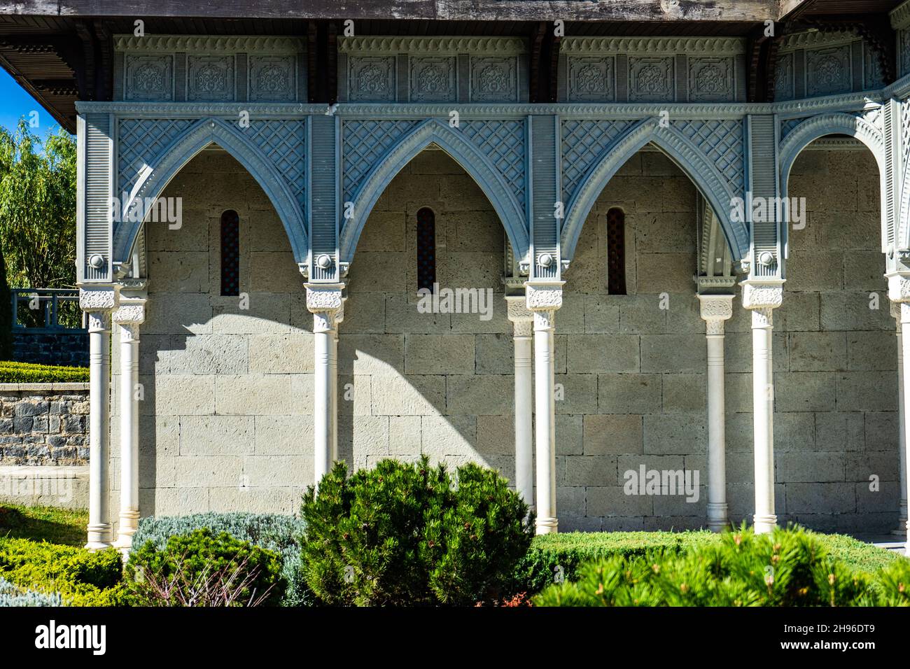 Famous arches with carving ornaments in arch hallway in medieval castle ...