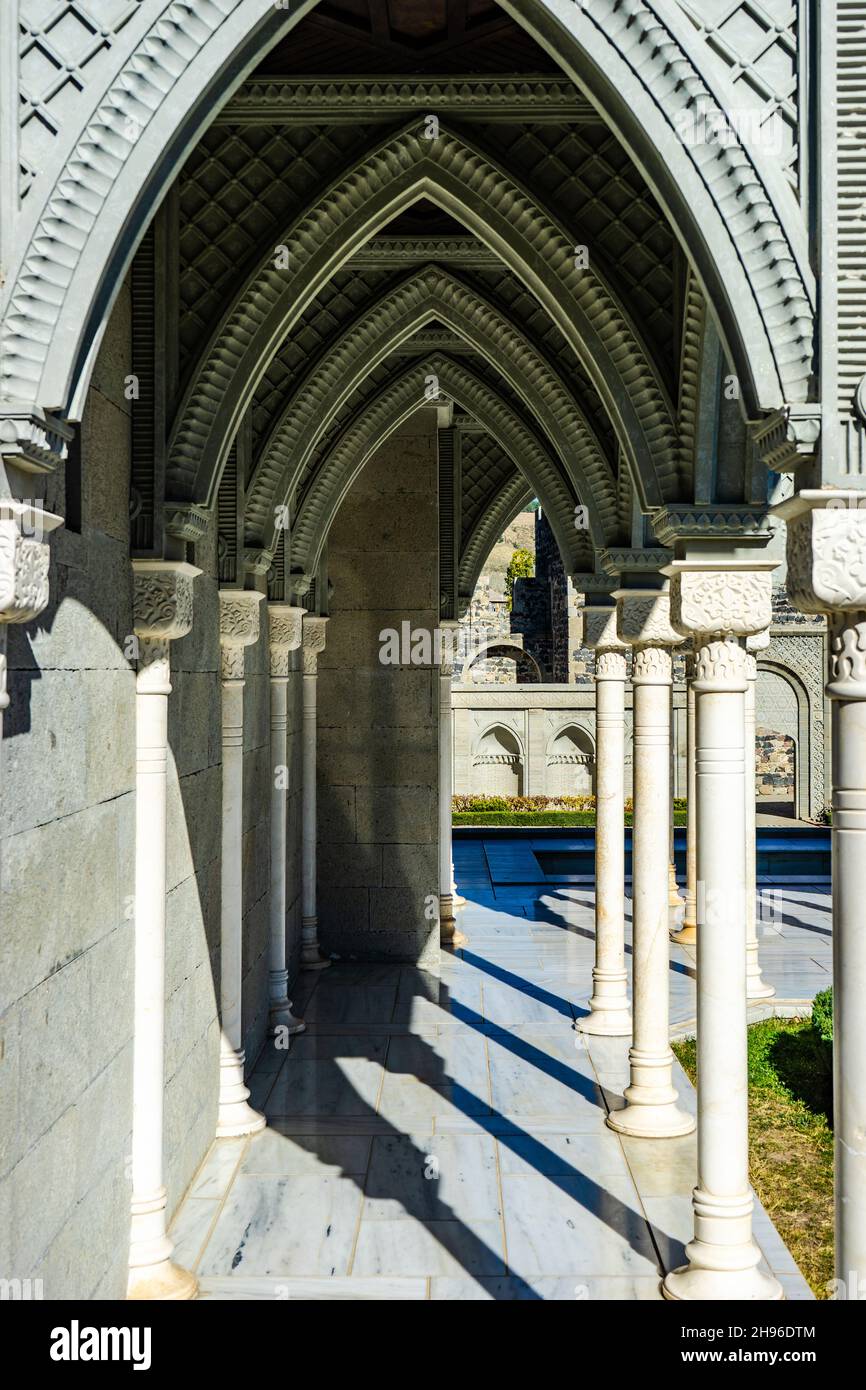 Famous arches with carving ornaments in arch hallway in medieval castle ...