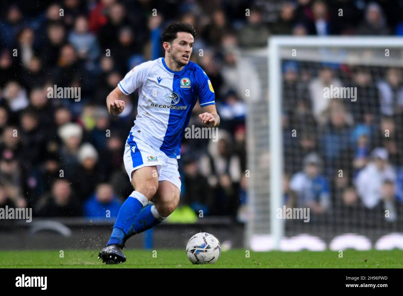 Lewis Travis #27 of Blackburn Rovers runs with the ball Stock Photo - Alamy